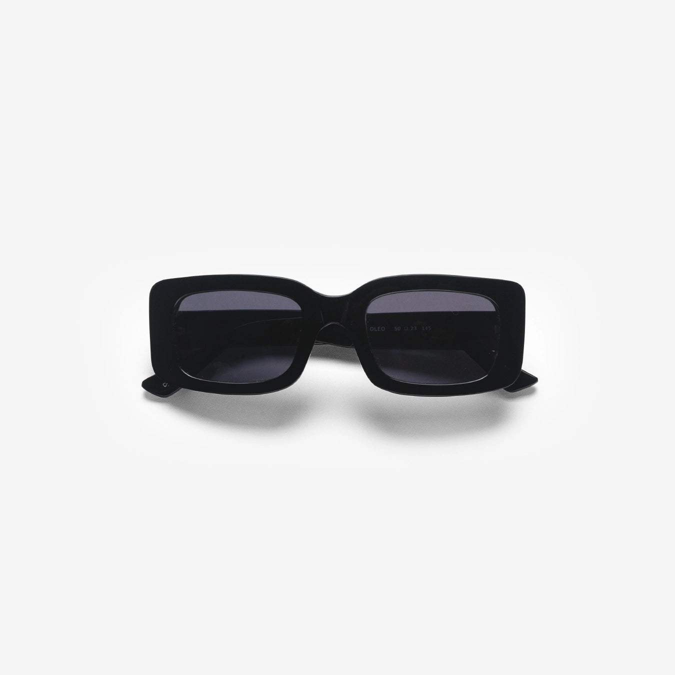Oleo - Black Sapphire | Statement black sunglasses with modern edge ...